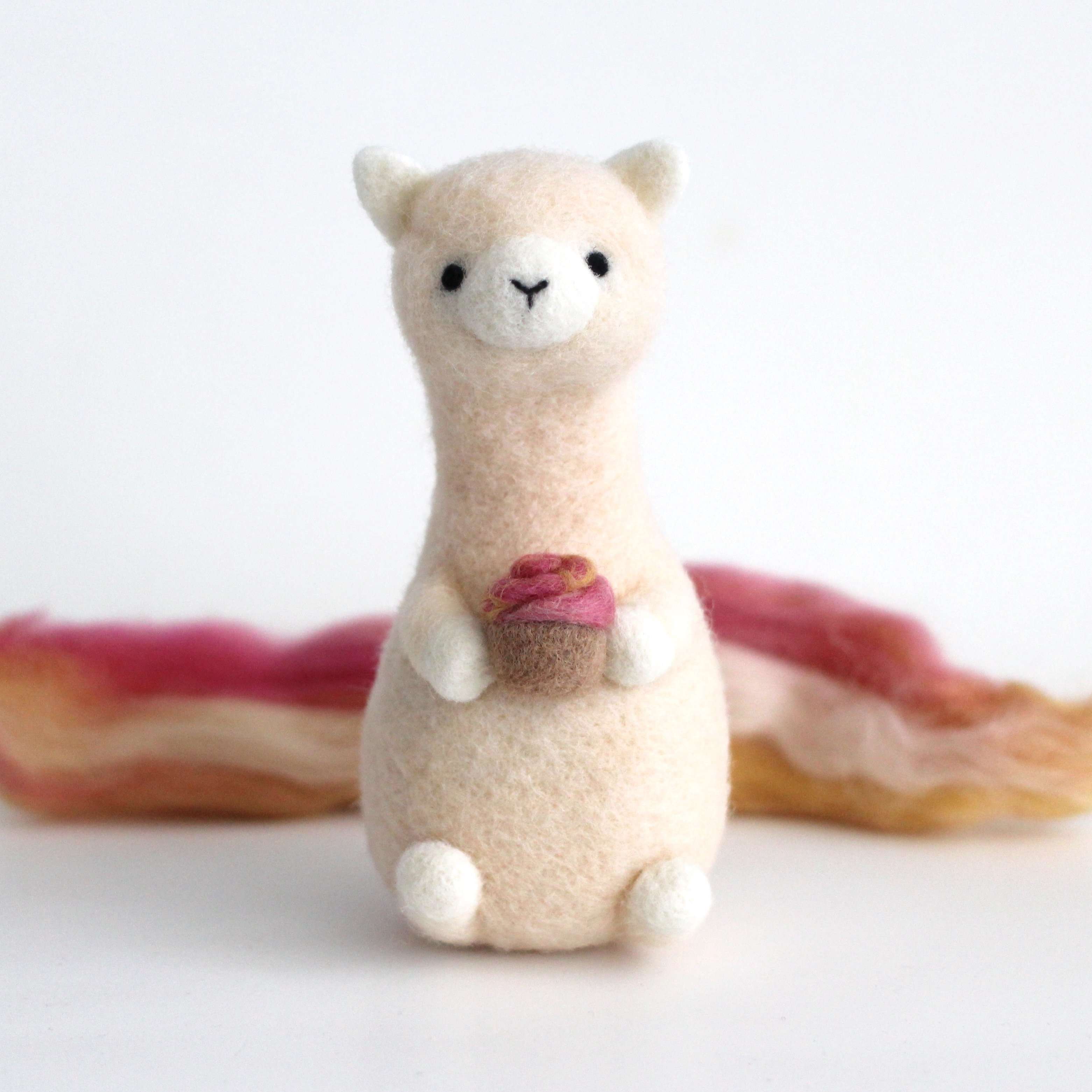 Needle Felted Alpaca holding Cupcake – Wild Whimsy Woolies
