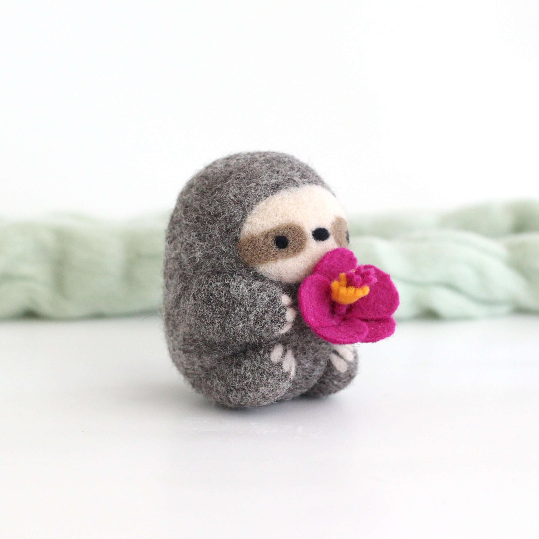 Needle Felted Sloth holding Hibiscus Flower – Wild Whimsy Woolies