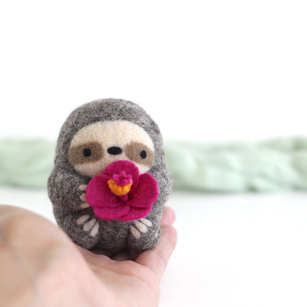 Needle Felted Sloth holding Hibiscus Flower – Wild Whimsy Woolies